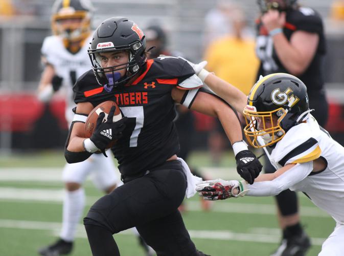 Tigers score once more following postponement, down Gretna East 23-13 ...