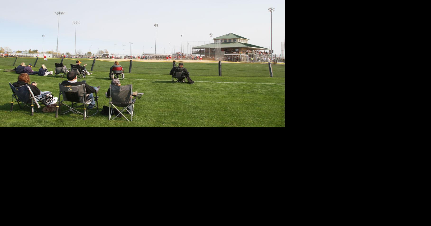 Softball spectators appreciate outfield seating | Covid-19 ...