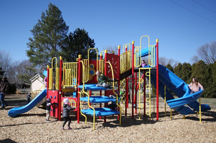 Neighbors band together to improve park playground | News ...