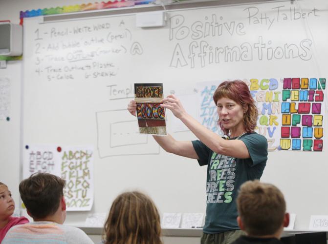 Artist in residence adds color to Adams Central students | News ...