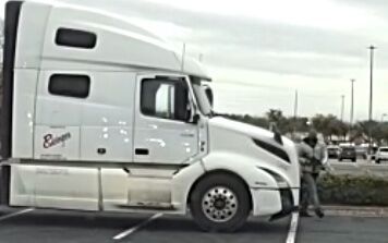 Truck driver charged after robbery and shootout | Archives ...