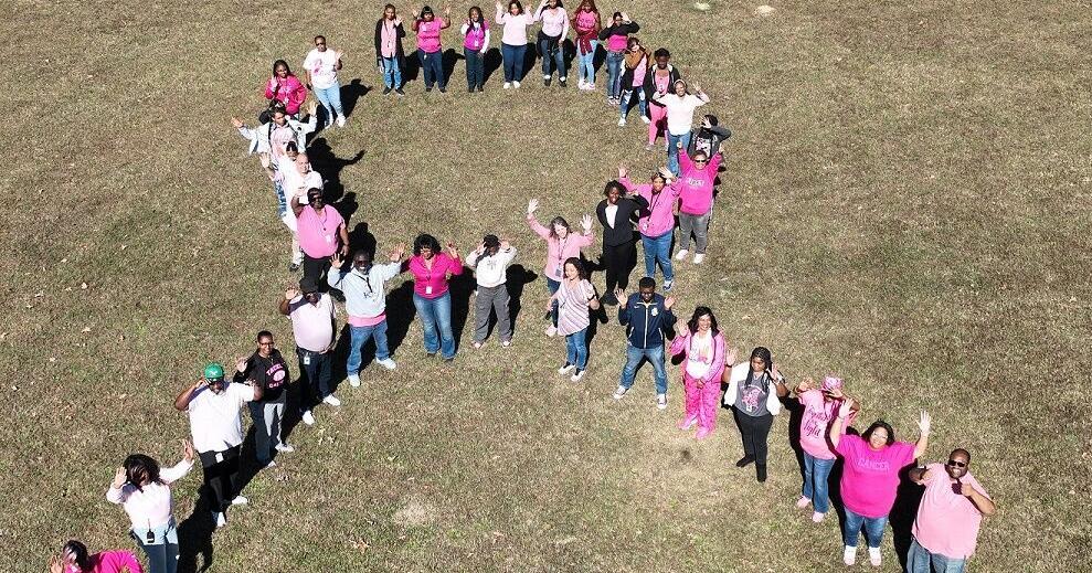 KJCC crew create human ribbon | Archives | hendersondispatch.com