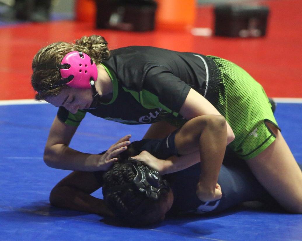 PHOTOS: Ola's Amani Jones wrestles to third straight state title ...