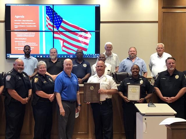 Locust Grove receives state accreditation for its police department ...