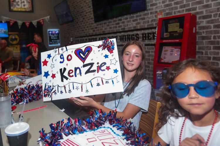 Photos: Watch party for Olympian McKenzie Long's 200-meter final run ...