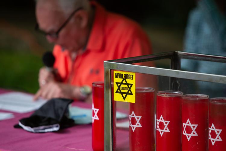Volunteers read aloud names of Holocaust victims in annual ceremony ...
