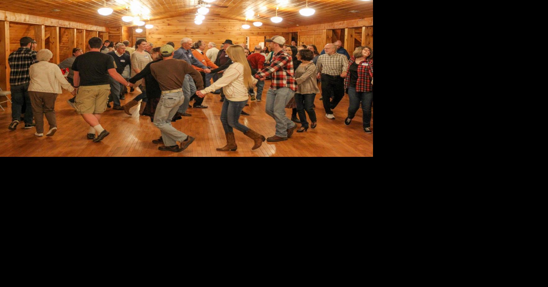 Old time square dance and music taking place at Heritage Farm ...