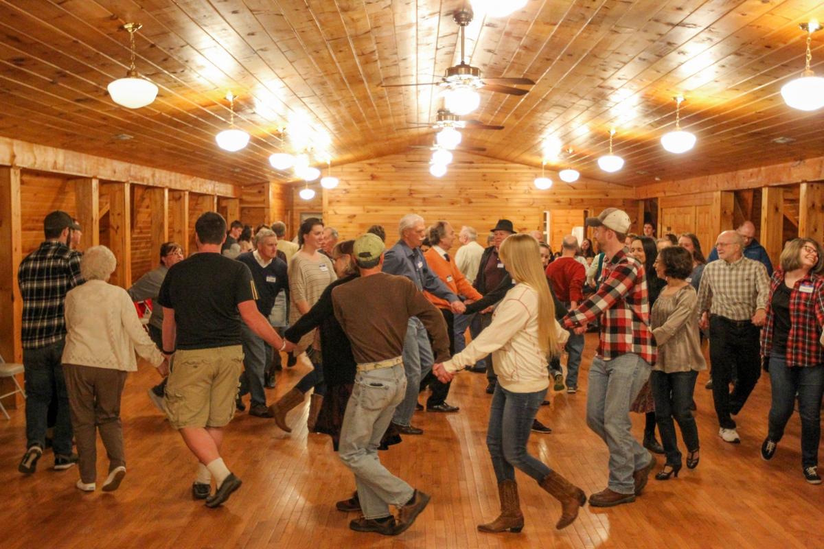 Old time square dance and music taking place at Heritage Farm ...