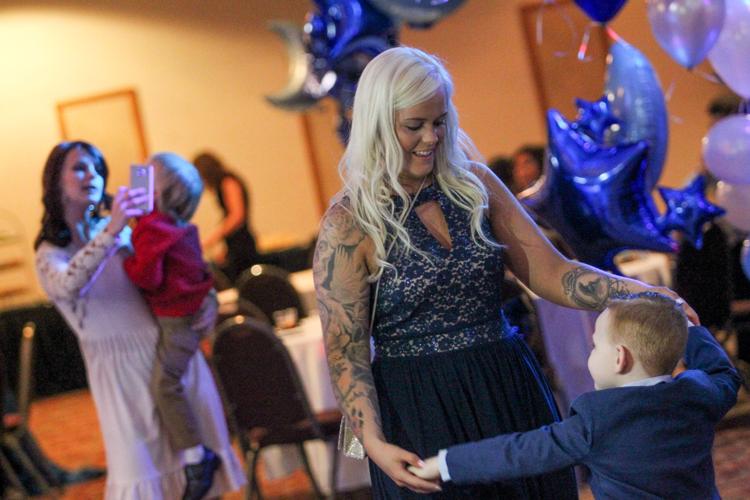 Photos: Mom & Son Prom at Pullman Plaza Hotel | Multimedia | herald ...