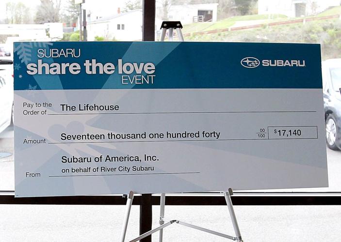 Subaru dealer donates $17,000 to Lighthouse | News | herald-dispatch.com