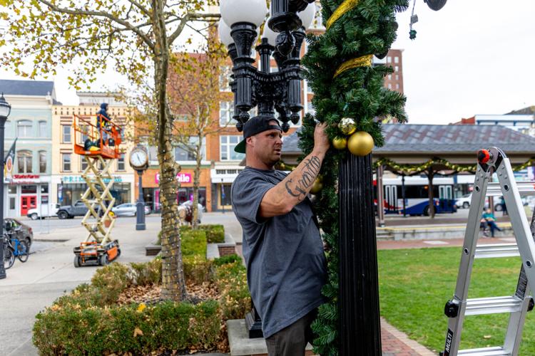 Holiday decorations spring up downtown | News | herald-dispatch.com