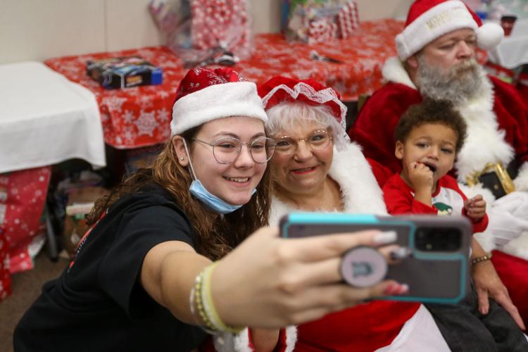 Deaf children share Christmas wishes with Santa during brunch event ...