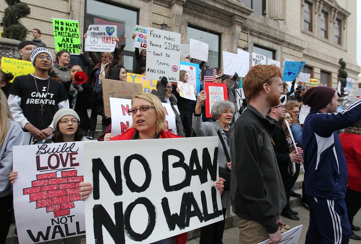 Photos: Immigration Order and Border Wall Protest at City Hall ...