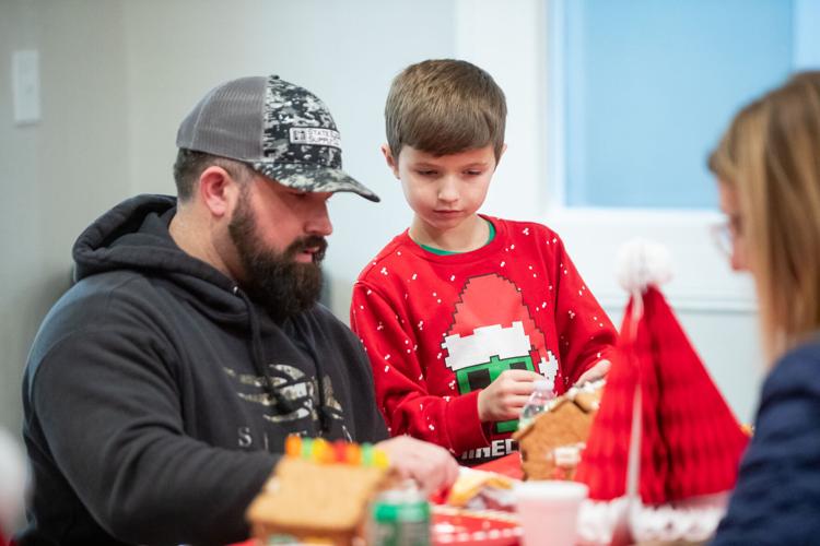 Kids get creative in building gingerbread houses | News | herald ...