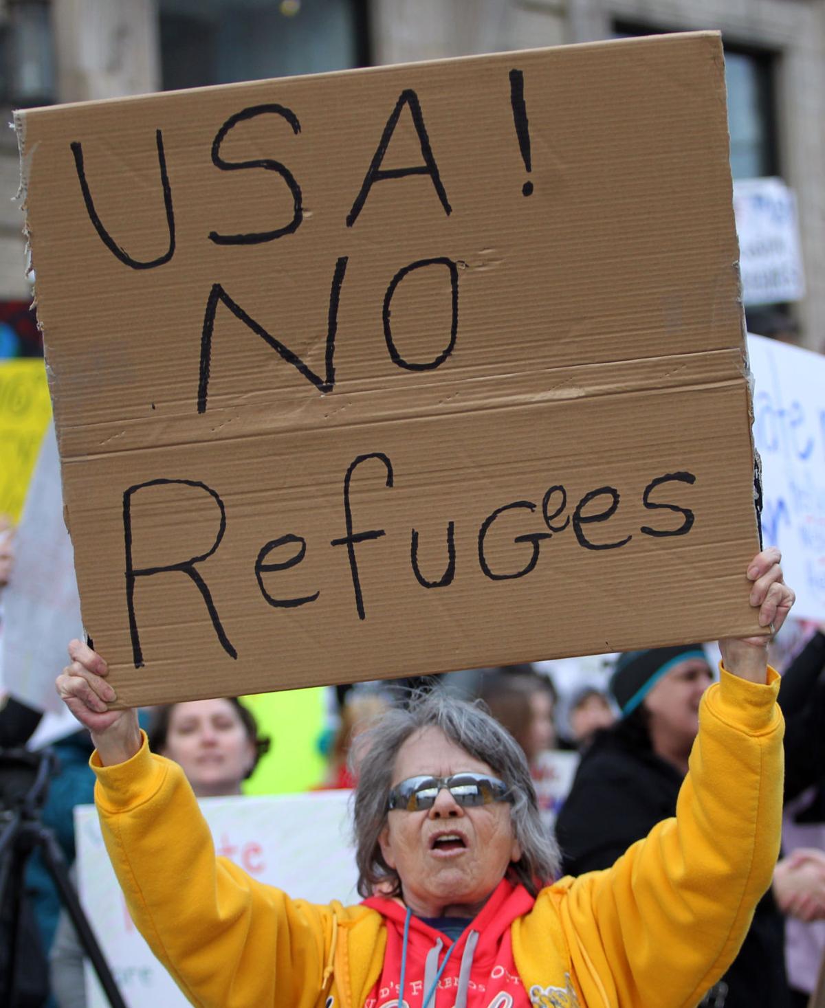 Photos: Immigration Order and Border Wall Protest at City Hall ...