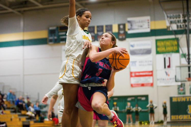 Photos: Girls basketball, Spring Valley takes on Huntington ...