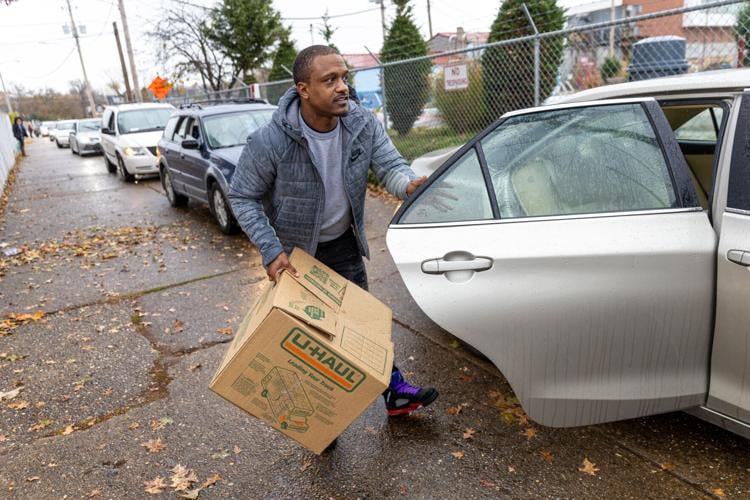 Photos: Thanksgiving boxes handed out at A.D. Lewis Community Center ...