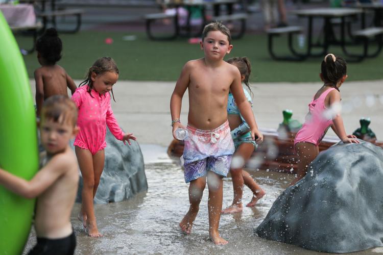 Photos: Kids cool off at St. Cloud Commons splash pad | Multimedia ...