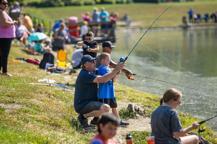Anglers bring children to Barboursville for annual kids fishing day ...
