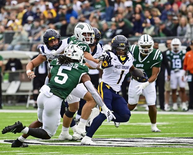 WVU top 10 stories of the year: Struggles, triumph and history headline ...