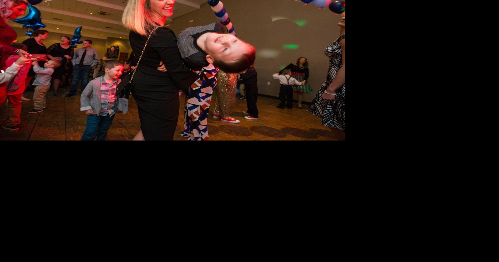 Photos: 3rd annual Mom & Son Prom | Multimedia | herald-dispatch.com