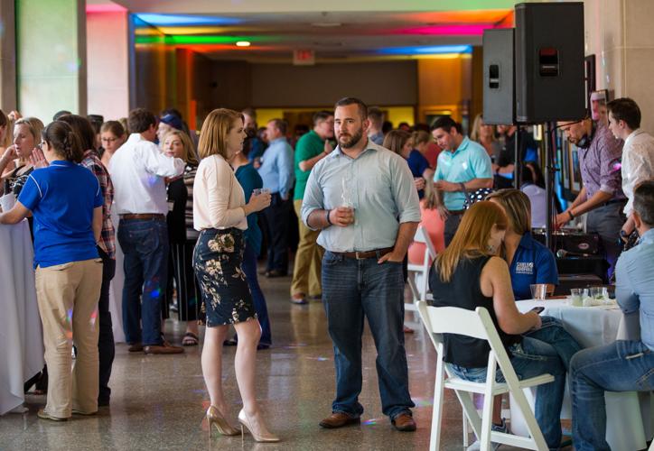 Fiesta-themed networking event draws young professionals to museum ...