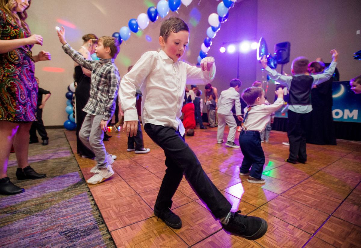 Photos: 3rd annual Mom & Son Prom | Multimedia | herald-dispatch.com