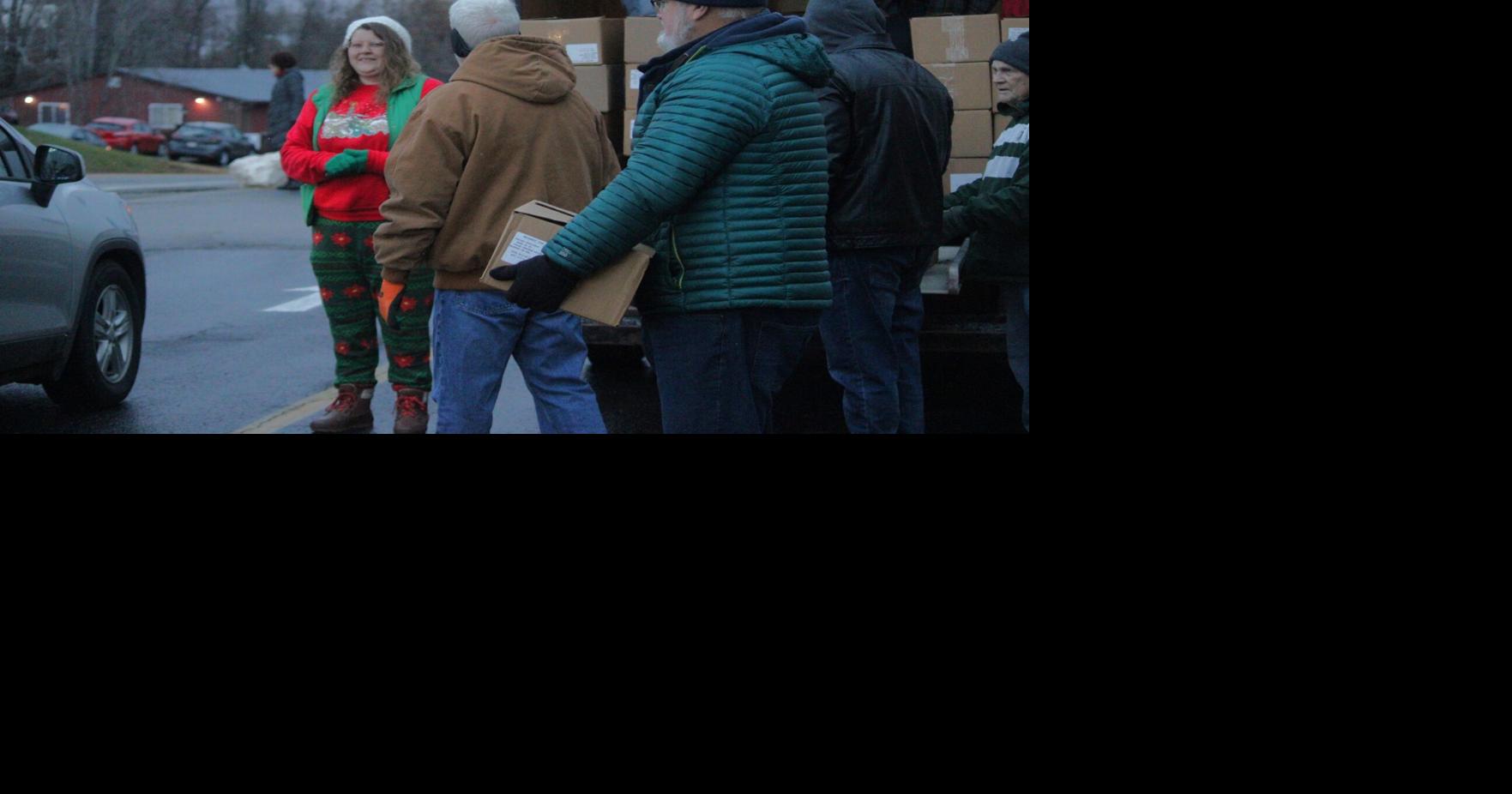 Church members give away hundreds of Christmas food boxes | Putnam News ...