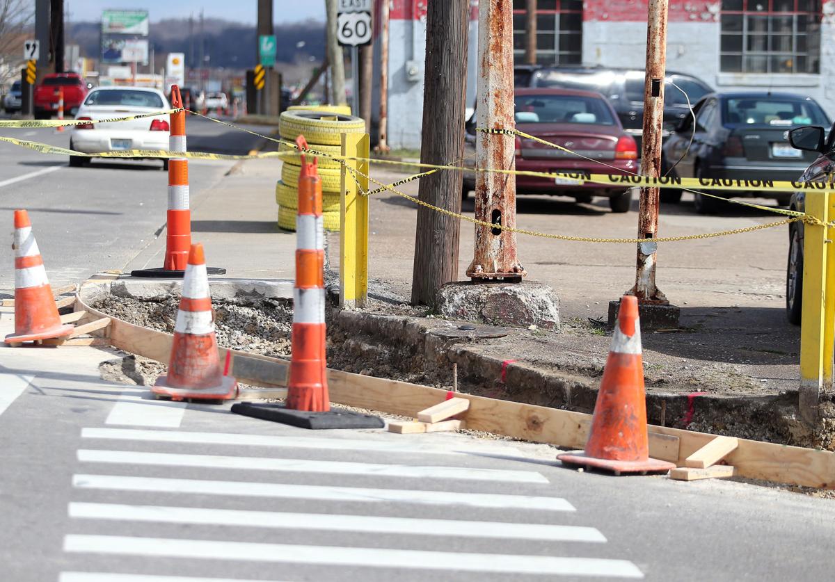 Installation of curb ramps brings Kenova sidewalks up to regulation ...
