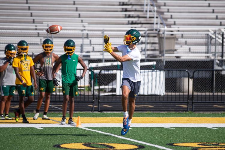 Photos: HHS football team conducts first day of summer practice ...