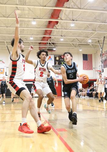Prep boys basketball: Nitro staves off Spring Valley to advance | High ...