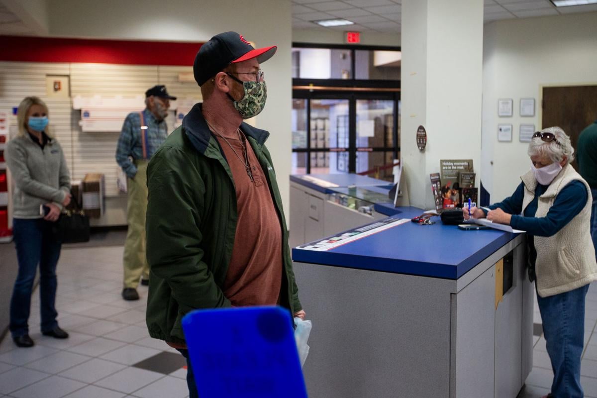 USPS slammed with 'historic' amount of mail this season | News | herald ...