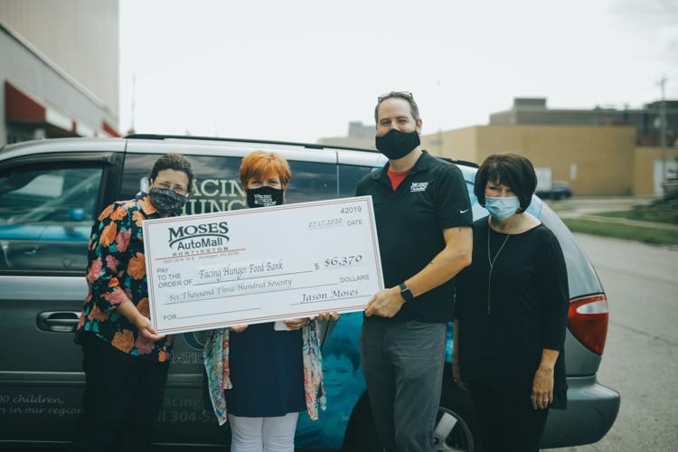Moses AutoMall makes donations to Facing Hunger Foodbank | Features ...