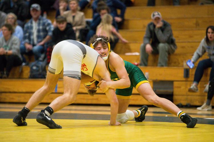 Photos: Cabell Midland wrestling team defeats Huntington High ...