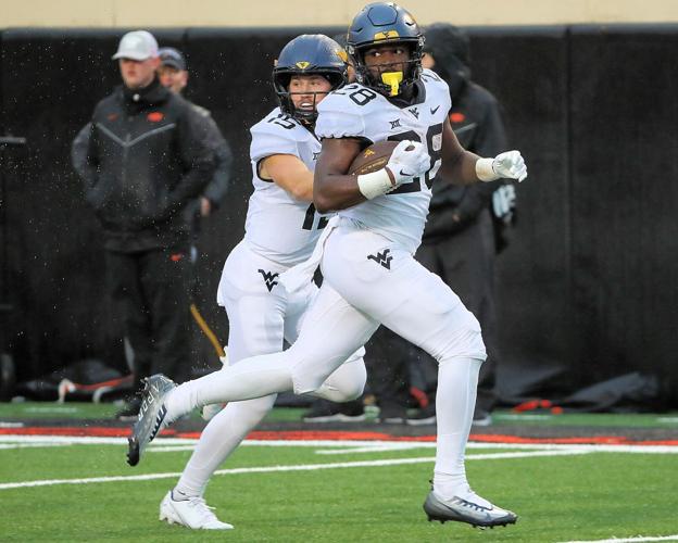 Anderson's TD runs lead Mountaineers past Oklahoma State 24-19 | Sports ...