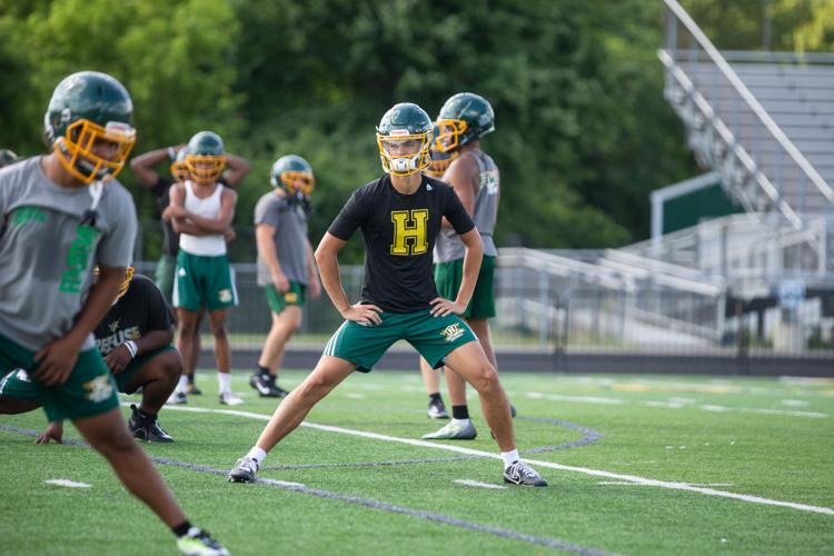 Photos: HHS football team conducts first day of summer practice ...