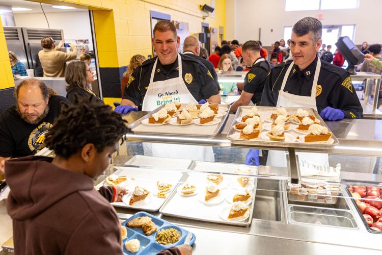 Photos: HPD officers serve Thanksgiving lunch at Huntington Middle ...