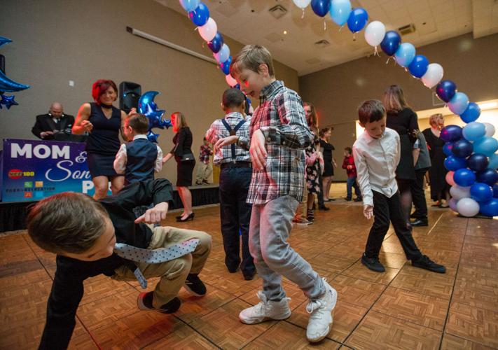 Photos: 3rd annual Mom & Son Prom | Multimedia | herald-dispatch.com