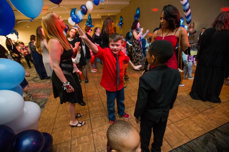 Photos: 3rd annual Mom & Son Prom | Multimedia | herald-dispatch.com