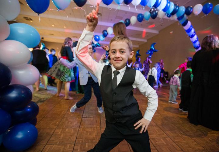 Photos: 3rd annual Mom & Son Prom | Multimedia | herald-dispatch.com