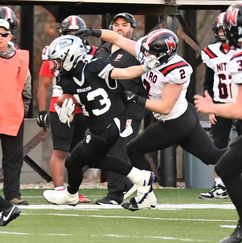 Prep football: Nitro breaks loose in second half to knock out North ...
