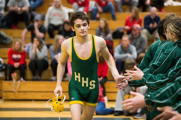 Photos: Cabell Midland wrestling team defeats Huntington High ...
