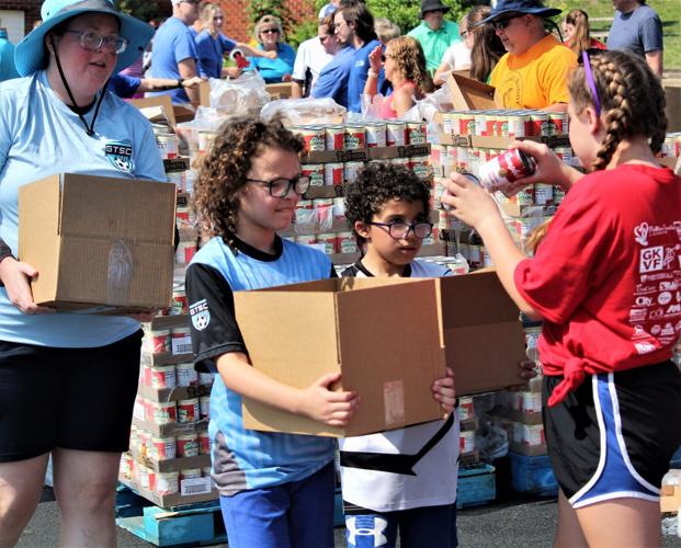 Volunteers pack summer food boxes for children | Putnam News | herald ...