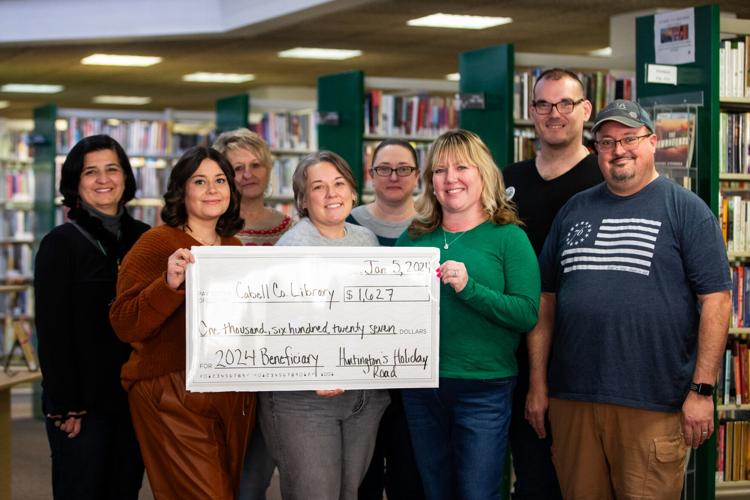 Check from Huntington Holiday Road contest proceeds presented to ...