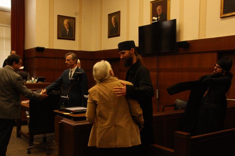 Father accused of aiding son in officer shooting gets mixed verdicts ...