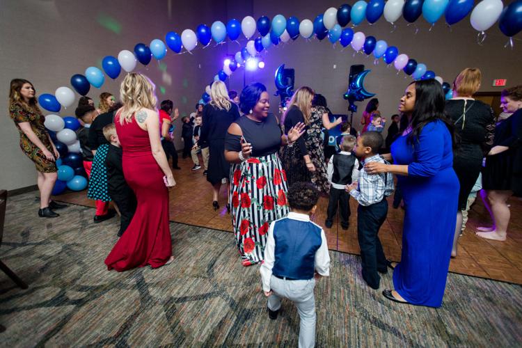 Photos: 3rd annual Mom & Son Prom | Multimedia | herald-dispatch.com
