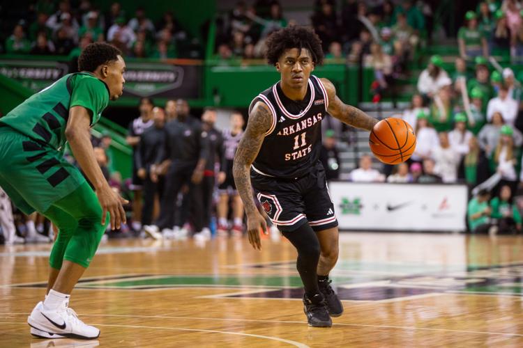 Photos: Marshall men's basketball tops Arkansas State 77-72 ...