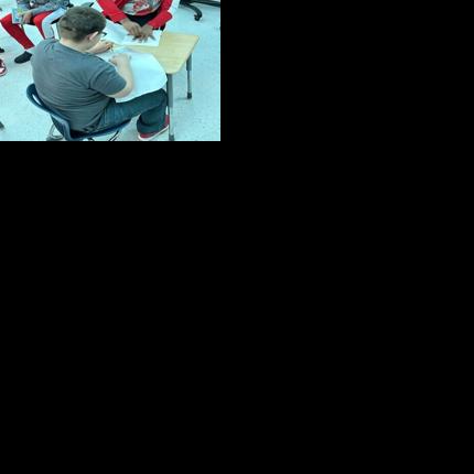 KCU men's basketball participates in Read Across America Week ...