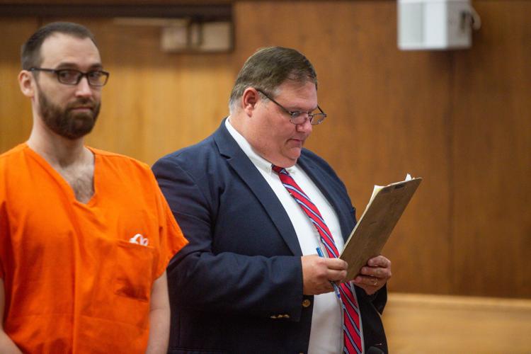 Attorneys reviewing mental evaluation of man wanting to represent ...