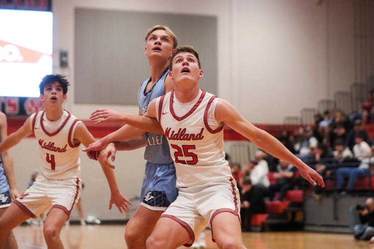Photos: Boy's high school basketball, Spring Valley vs. Cabell Midland ...